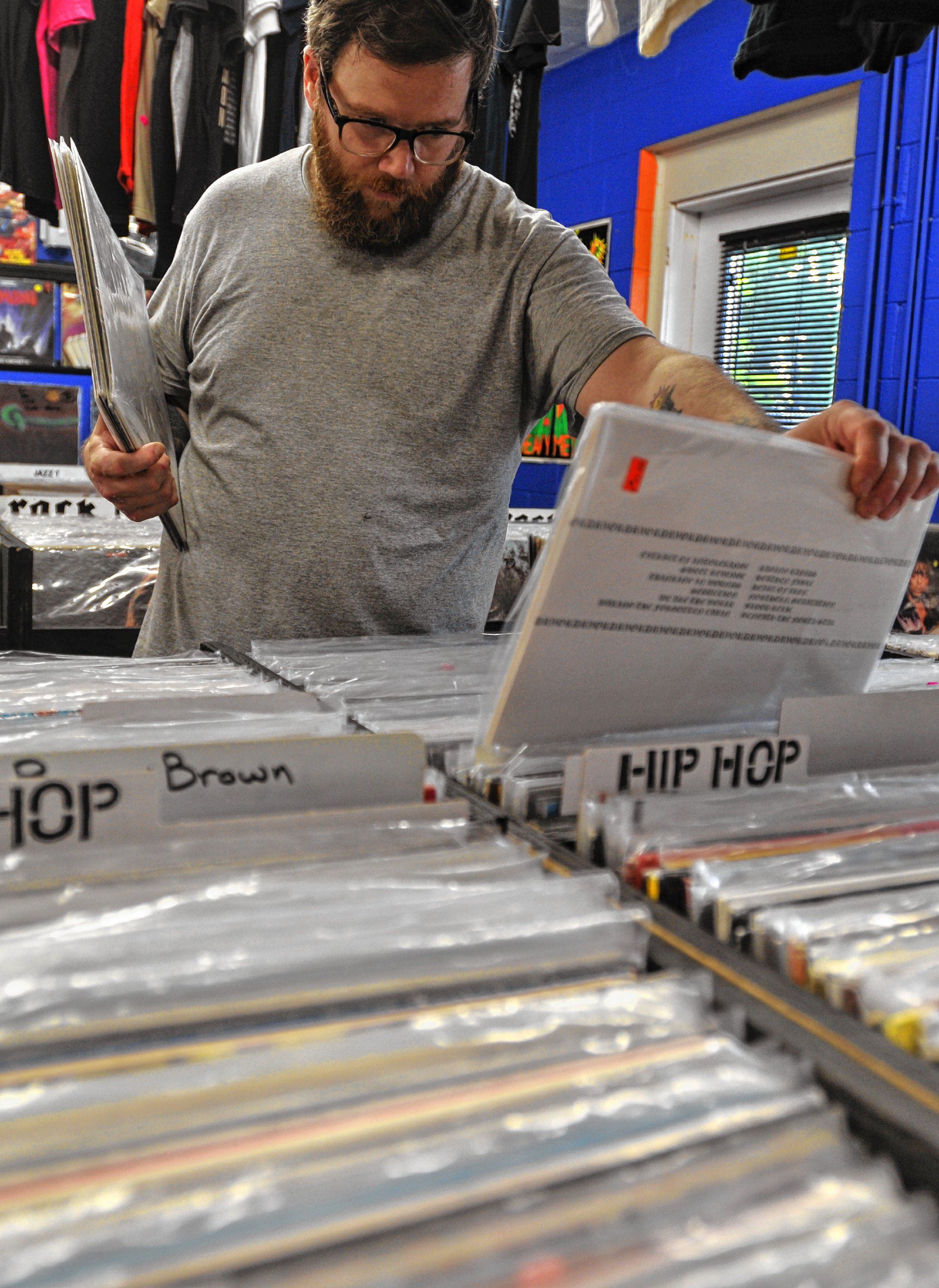 Andy Kivela of Easthampton looks through records at Electric Eye in ...