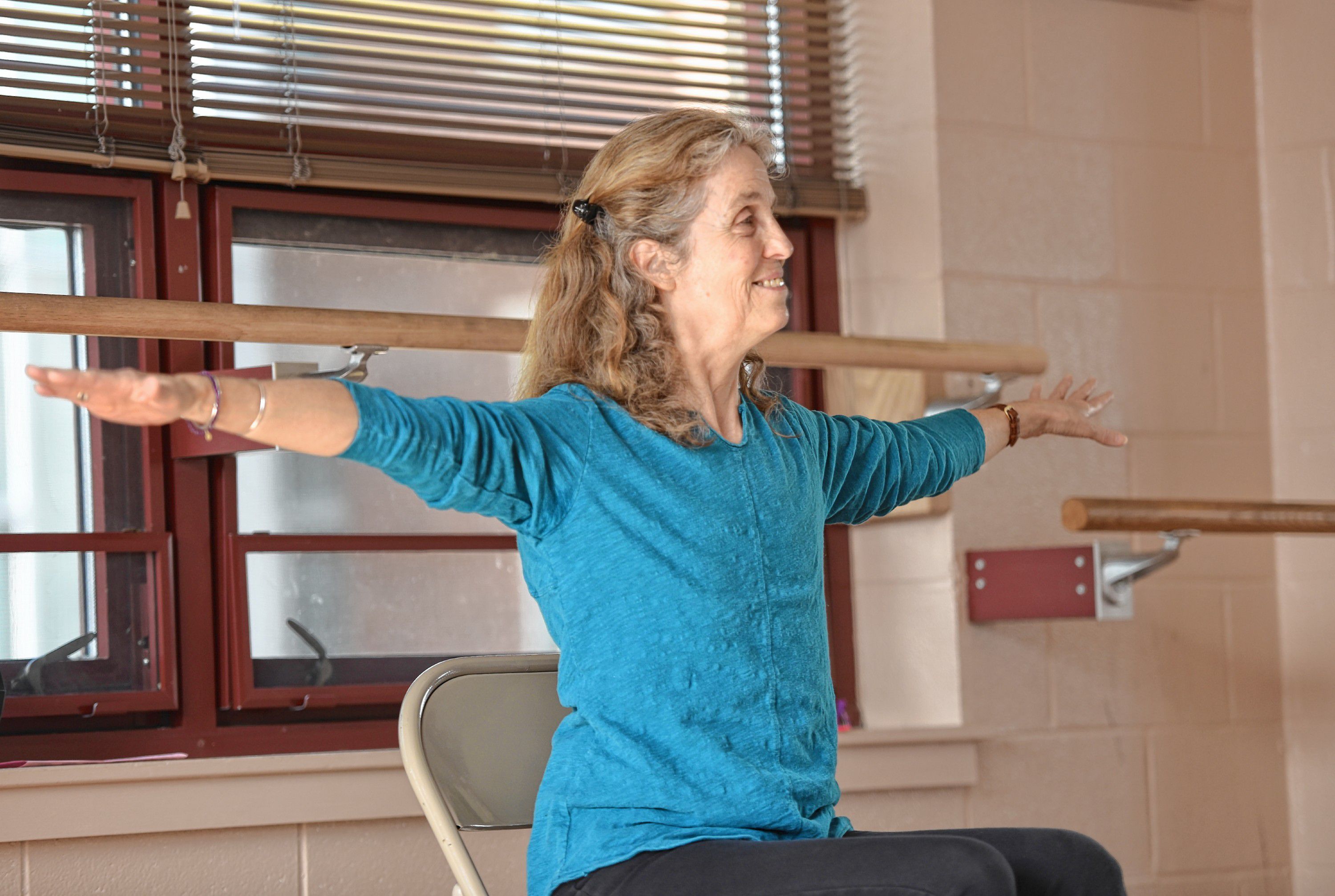 Yoga Instructor Pam Roberts runs a yoga class for people dealing with ...