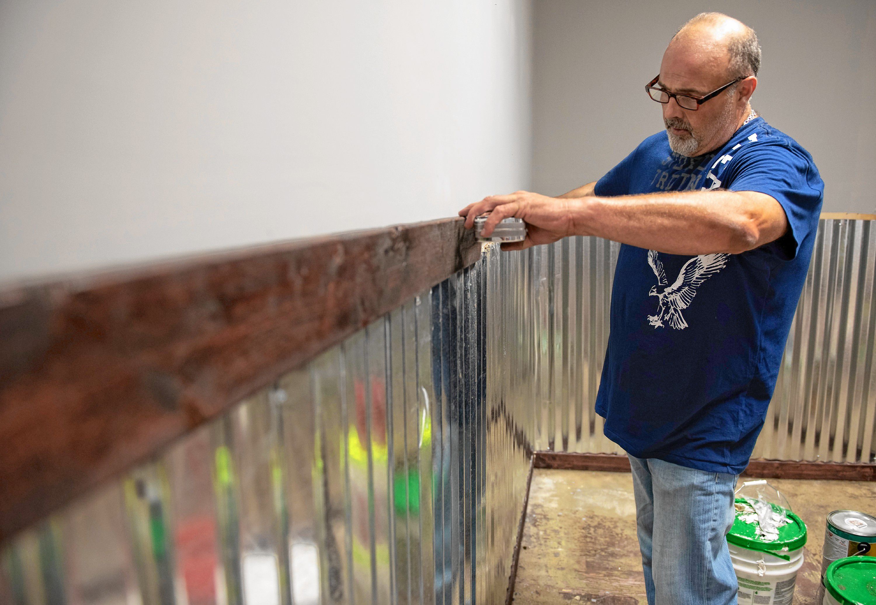 Frank Dailey, owner of Boston Bud Factory in Holyoke, works on the ...